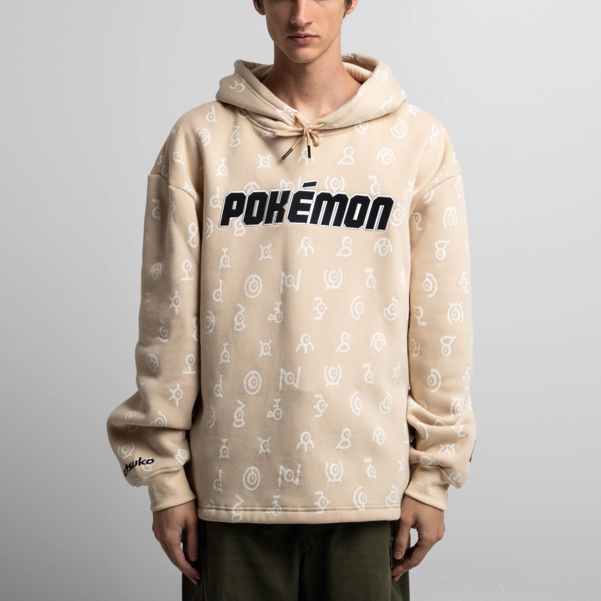 Pokémon Unown Tan Hoodie | Official Apparel & Accessories | Atsuko - Pokémon | Atsuko